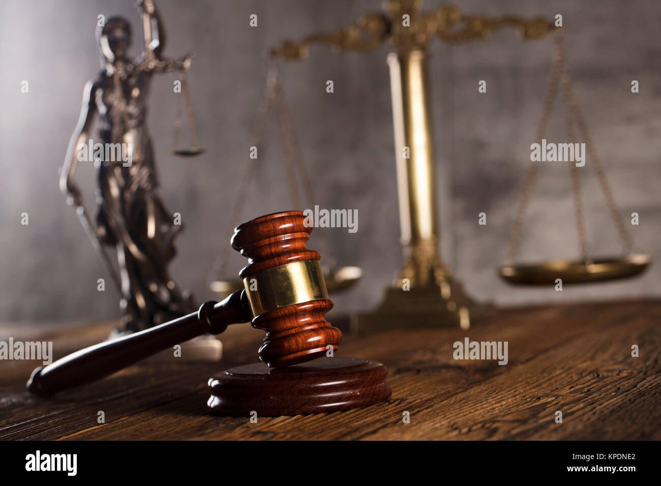 Statue of justice and gavel of the judge on a stone background and ... Statue of justice and gavel of the judge on a stone background and ...