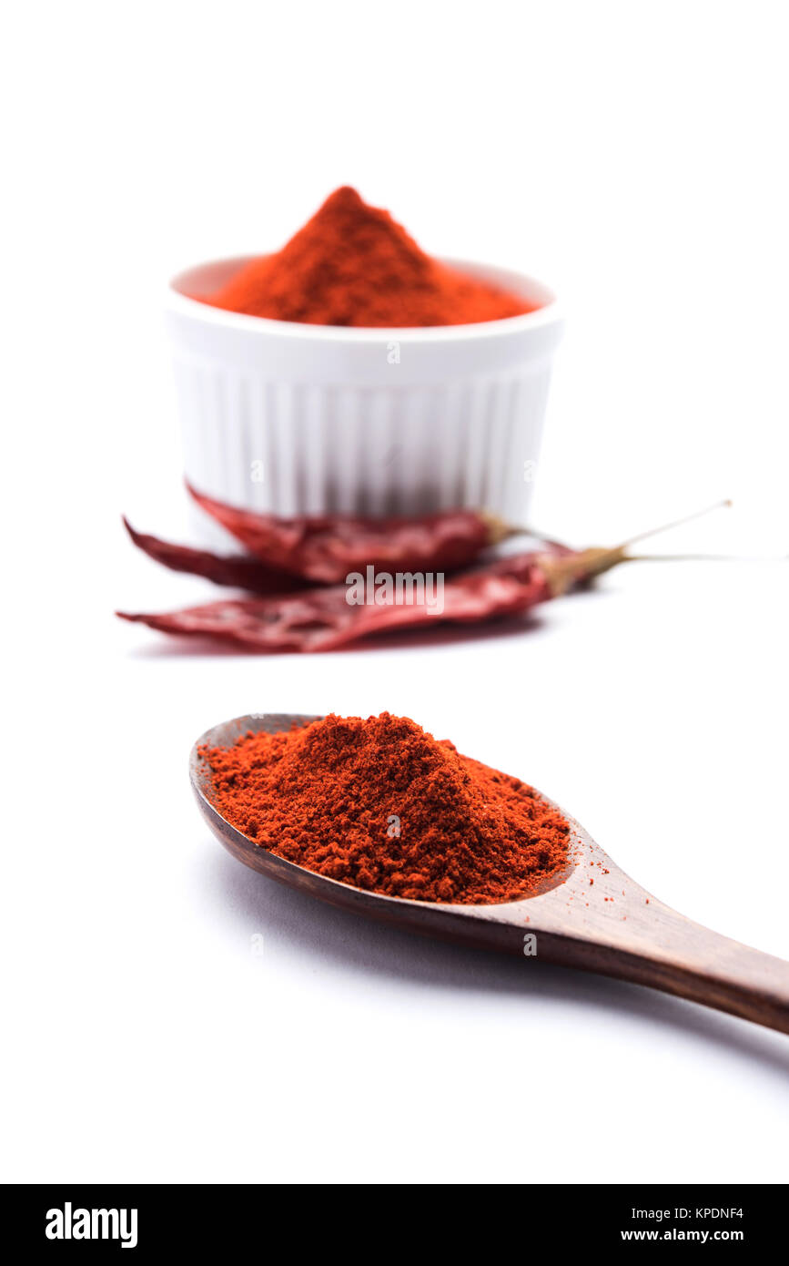 Red Chilly Powder in a bowl with dried red chillies over colourful ...