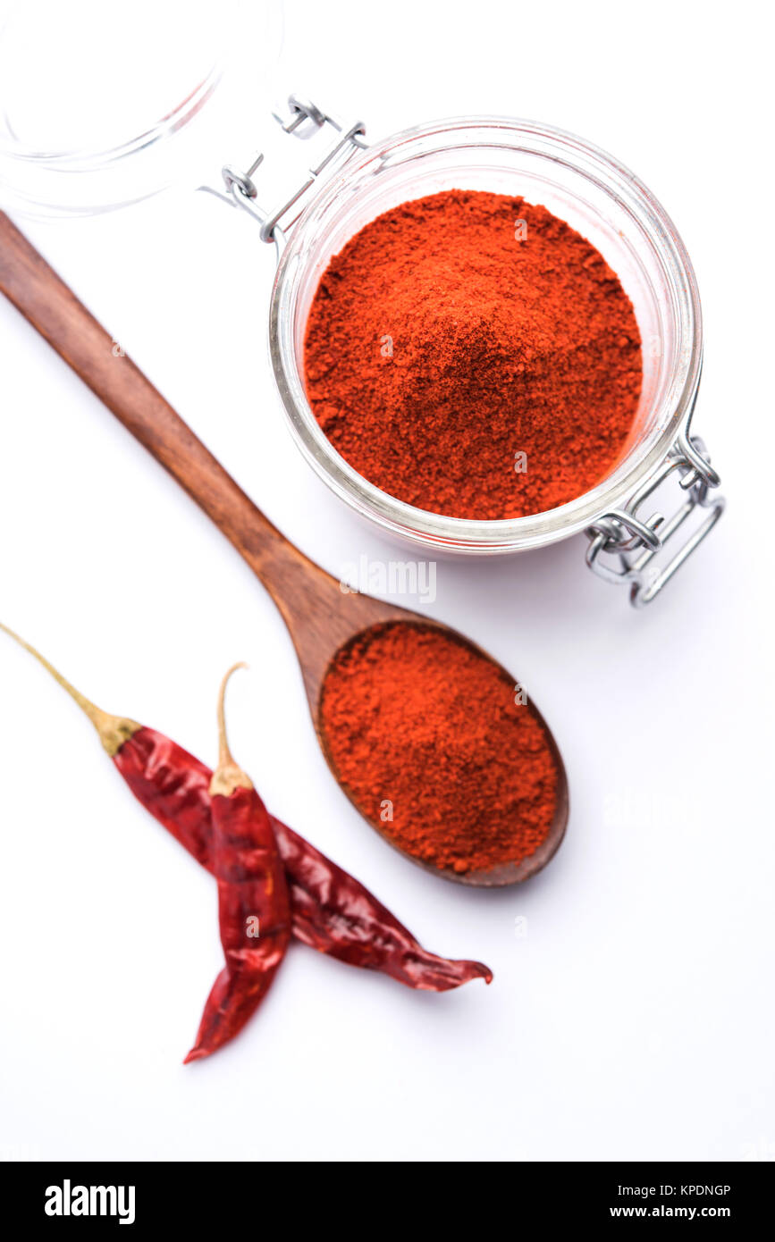 Red Chilly Powder in a bowl with dried red chillies over colourful ...