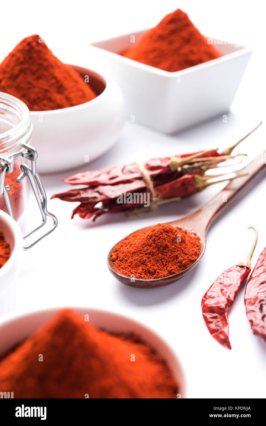 Red Chilly Powder in a bowl with dried red chillies over colourful ...