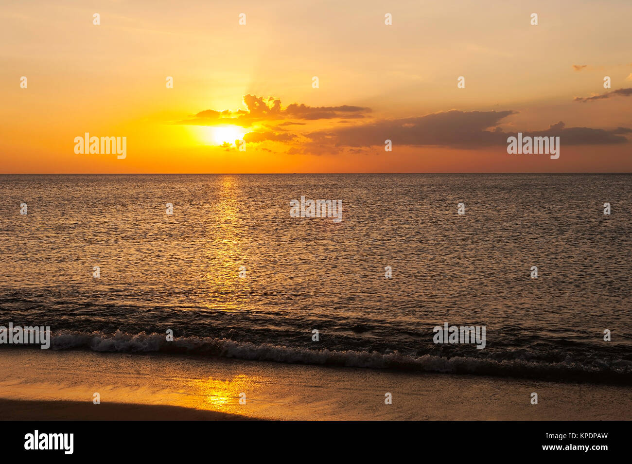 Beach with color of the sunset in twilight Stock Photo - Alamy