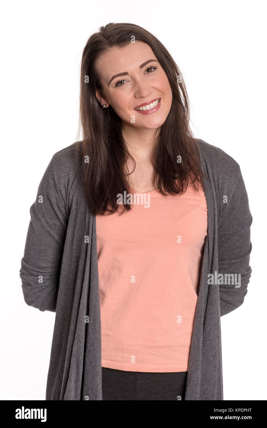 young woman crosses her arms behind her back and smiling Stock Photo ...