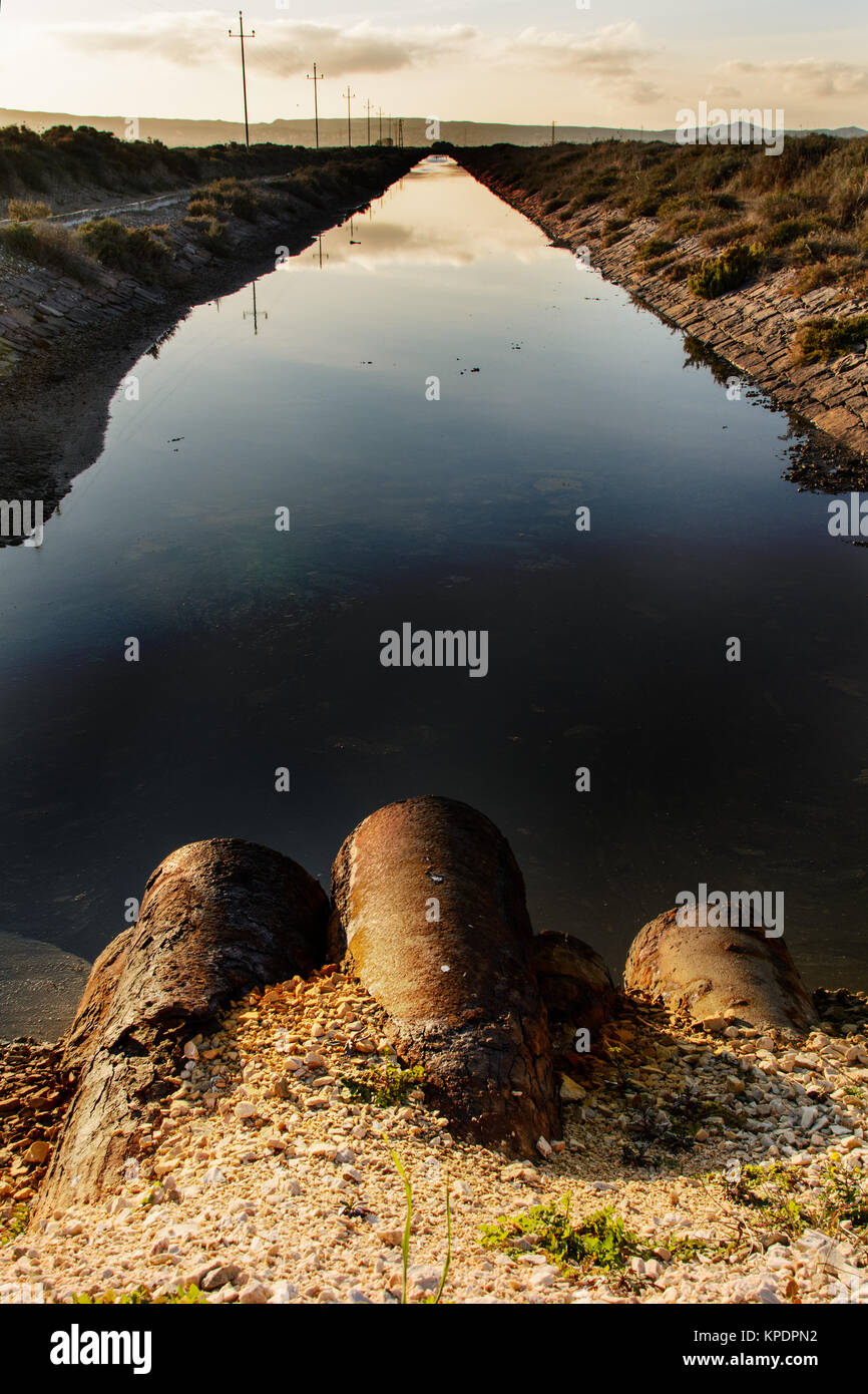 Drain in the River Stock Photo - Alamy