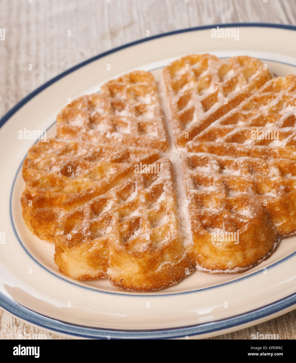 Sweet waffle on a plate Stock Photo - Alamy