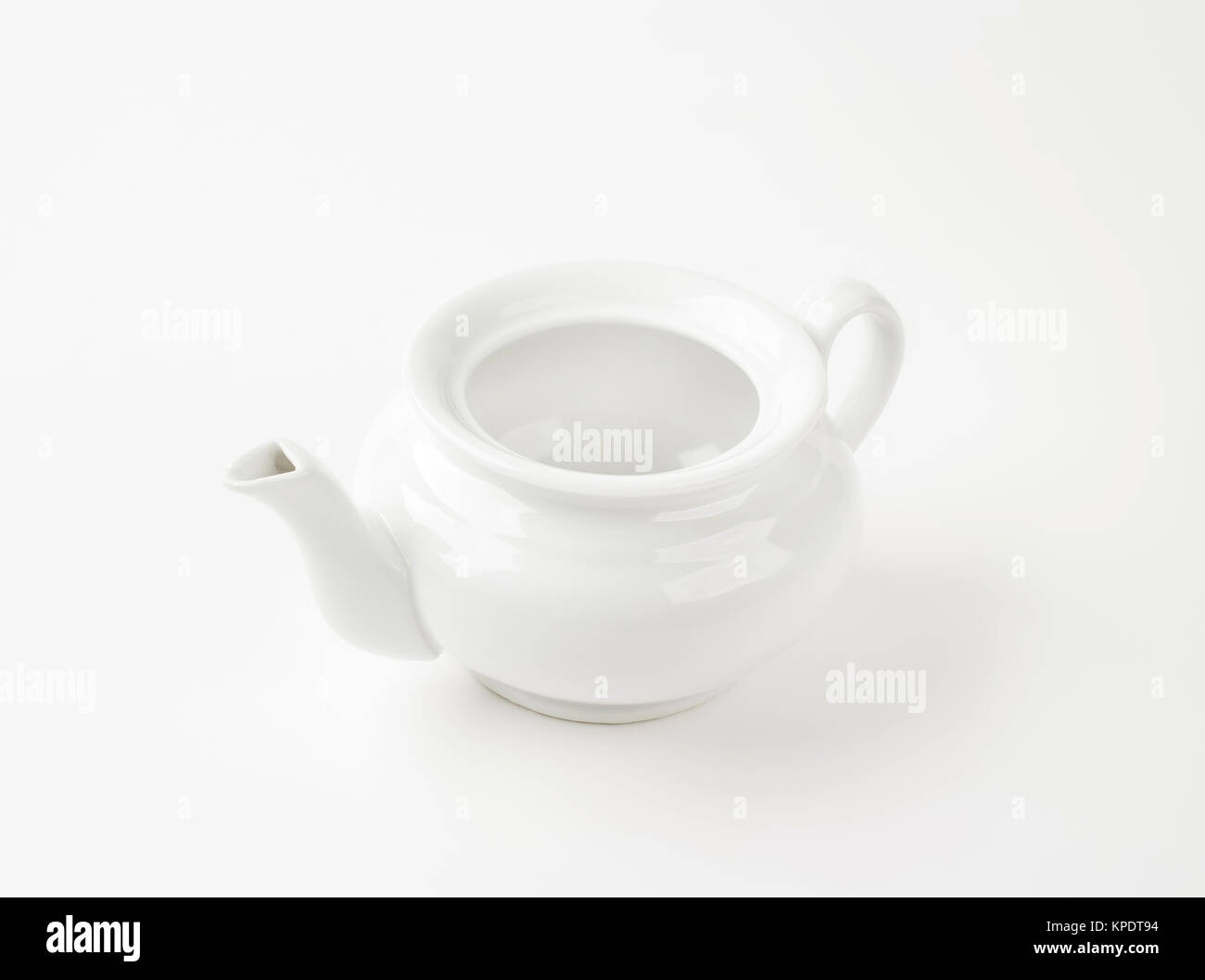 White porcelain teapot Stock Photo - Alamy