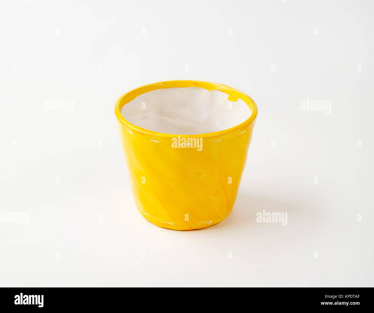yellow flower pot Stock Photo - Alamy