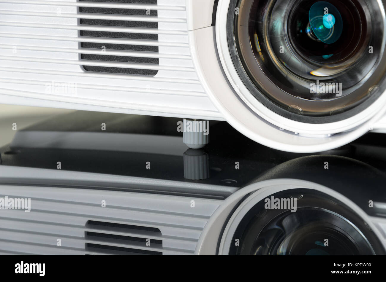 White home cinema projector, mirroring on the surface Stock Photo - Alamy