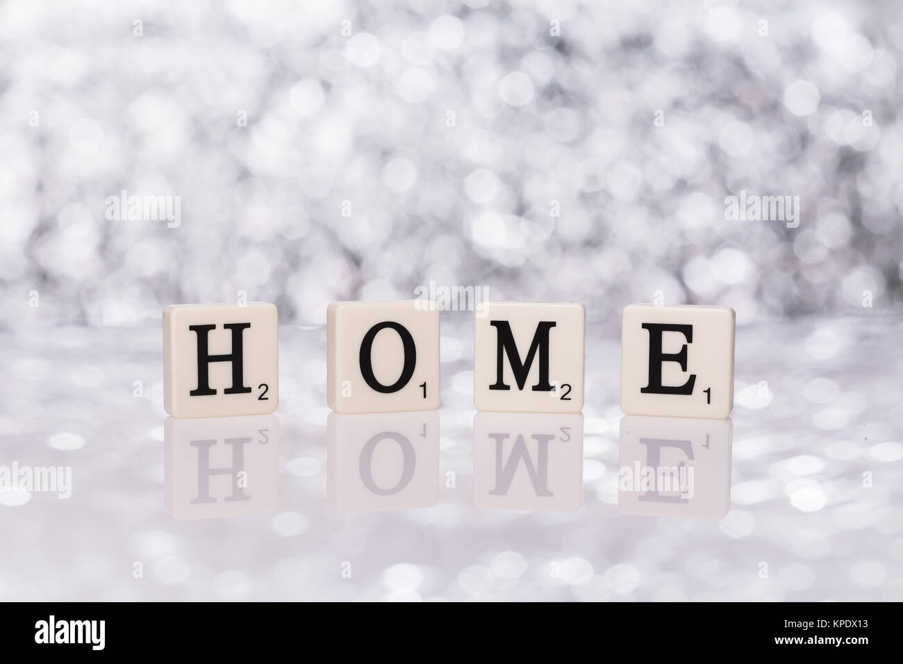 Written word tiles with letters from the game Scrabble - home Stock ...