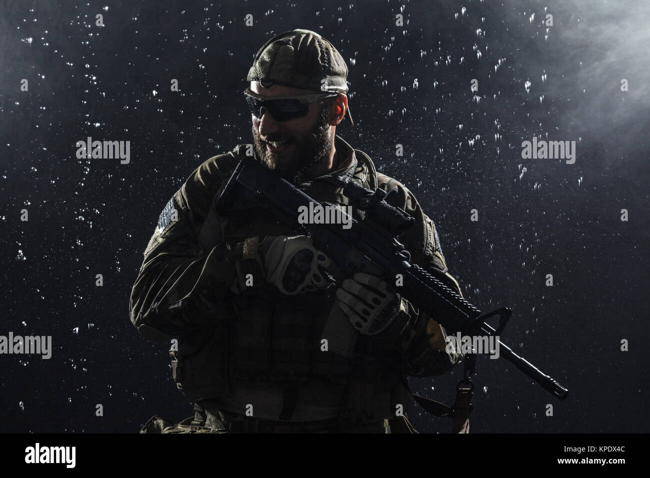 US Army soldier in the rain Stock Photo - Alamy