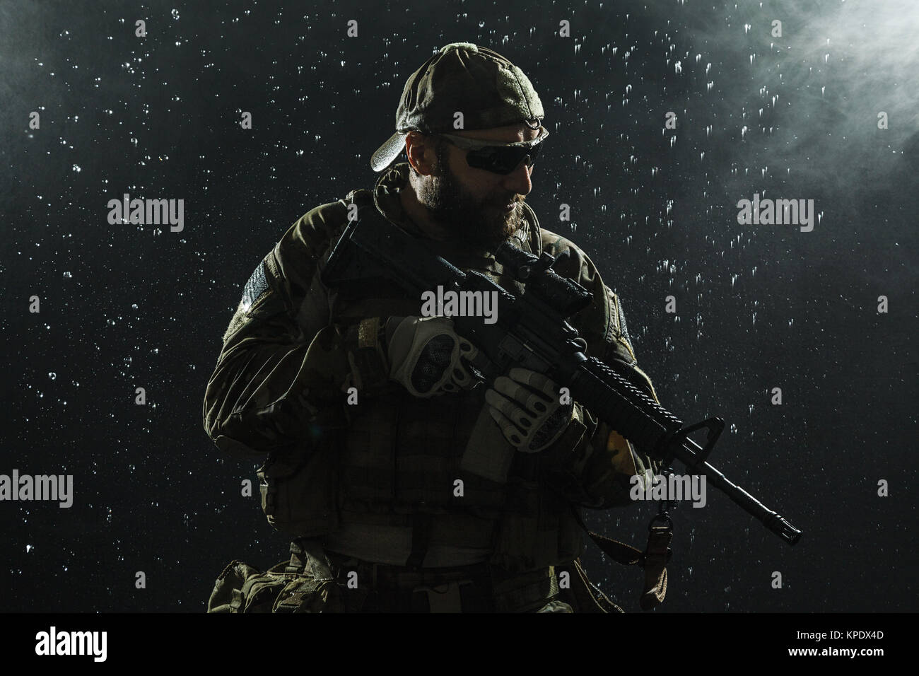 US Army soldier in the rain Stock Photo - Alamy