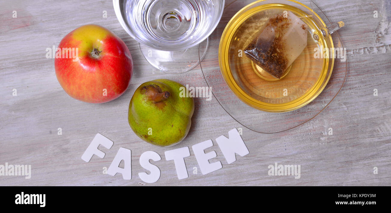 fasting tea letter wood Stock Photo - Alamy