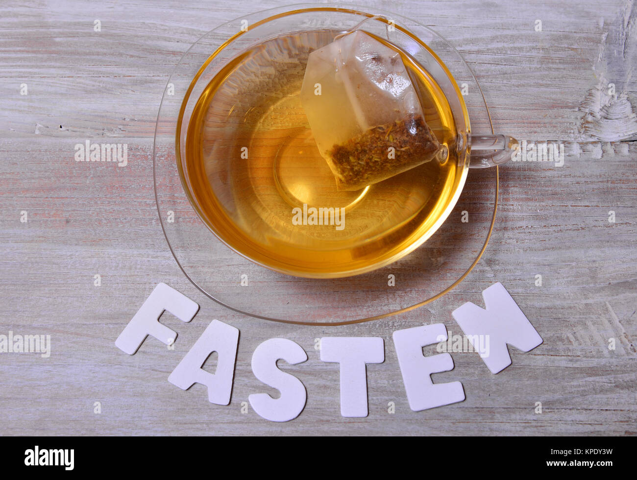 fasting tea letter wood Stock Photo - Alamy