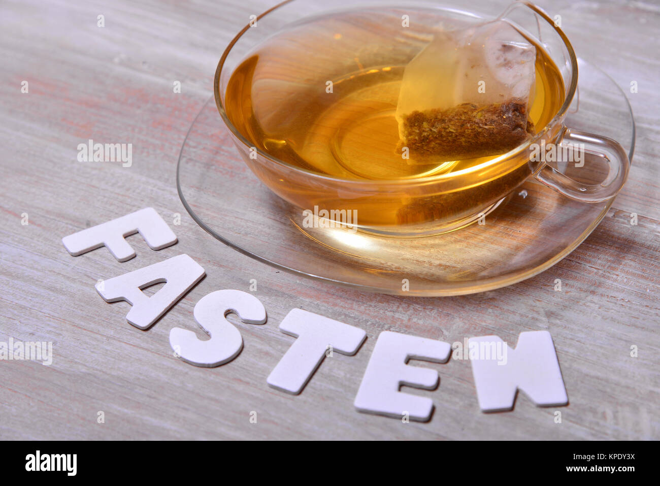 fasting tea letter wood Stock Photo - Alamy