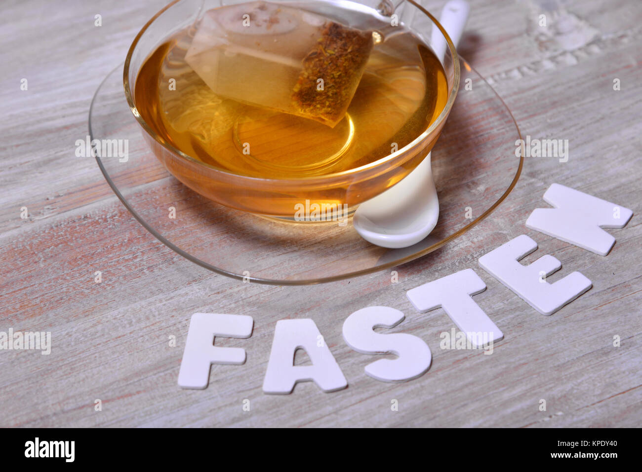 fasting tea letter wood Stock Photo - Alamy