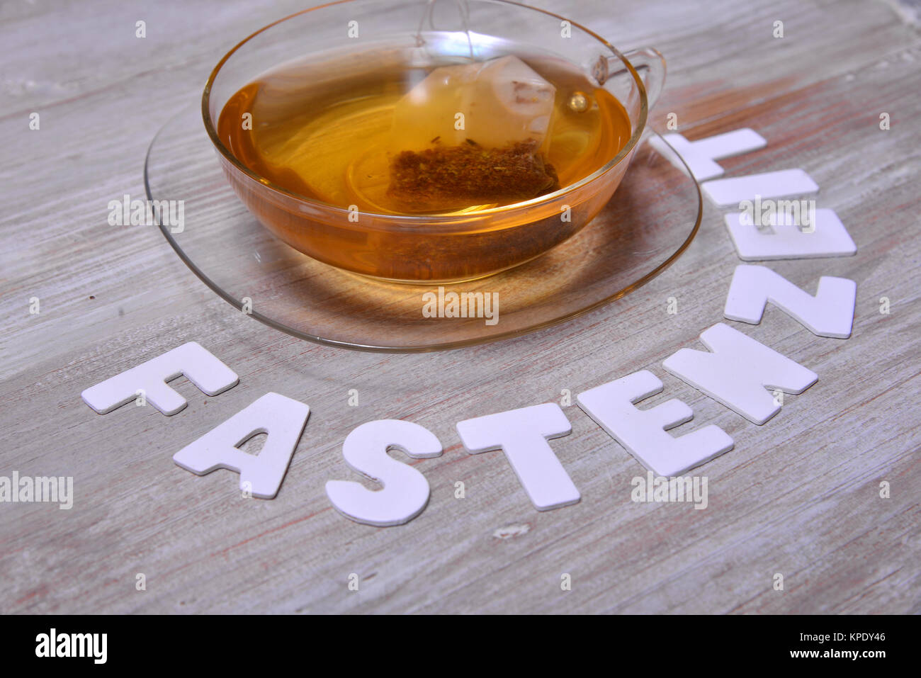 fasting tea letter wood Stock Photo - Alamy