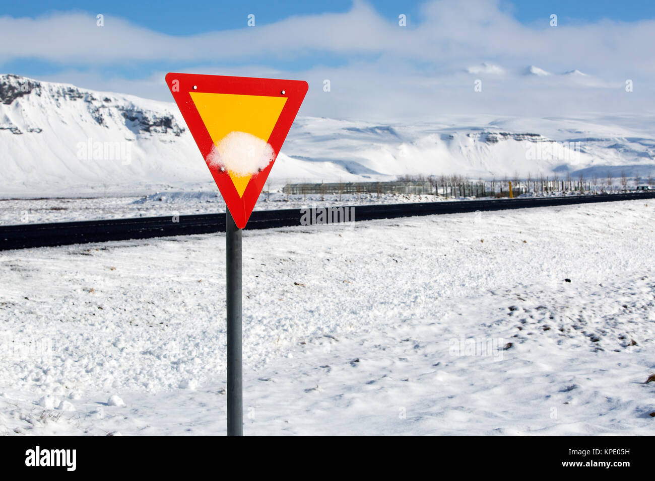 Traffic sign at the road in Iceland, wintertime Stock Photo - Alamy