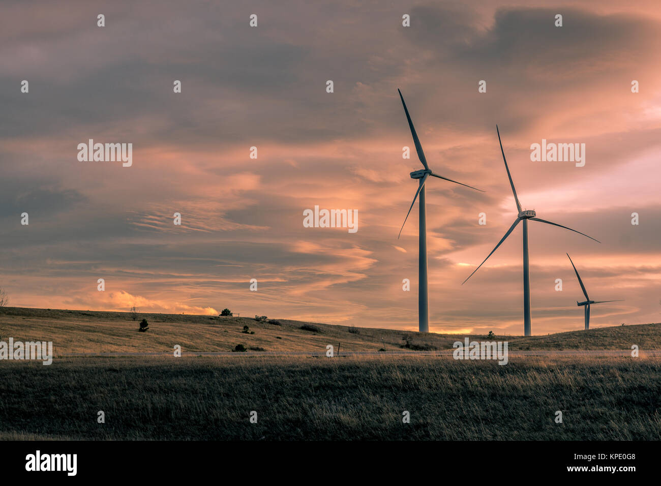 Global warming wind turbines sunset hi-res stock photography and images ...