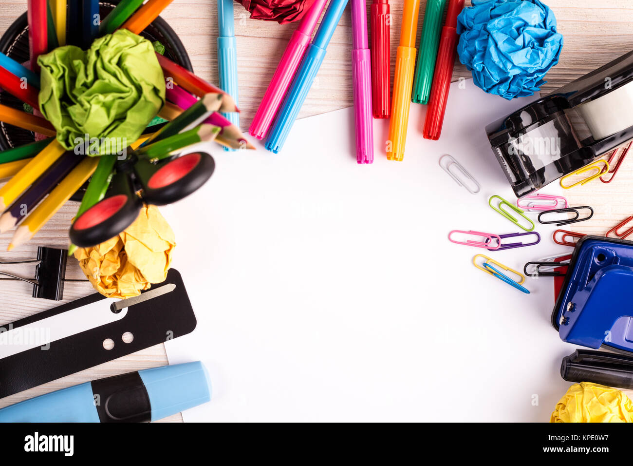 Office supplies on wooden desk Stock Photo - Alamy