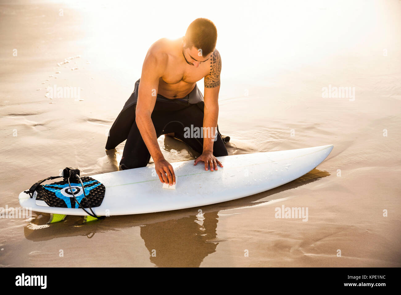Getting ready for surf Stock Photo - Alamy