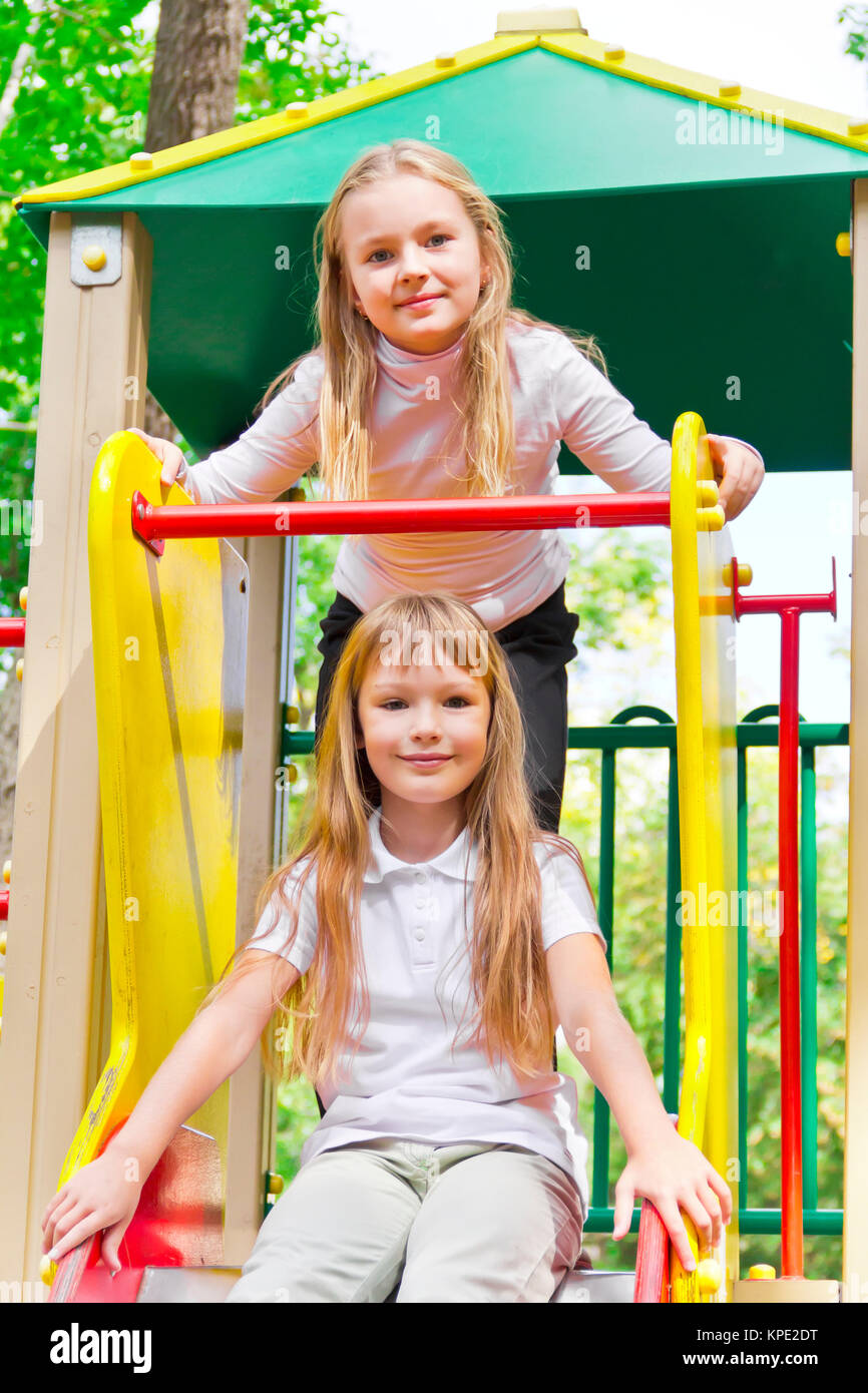 Two active girls on nursery platform Stock Photo - Alamy