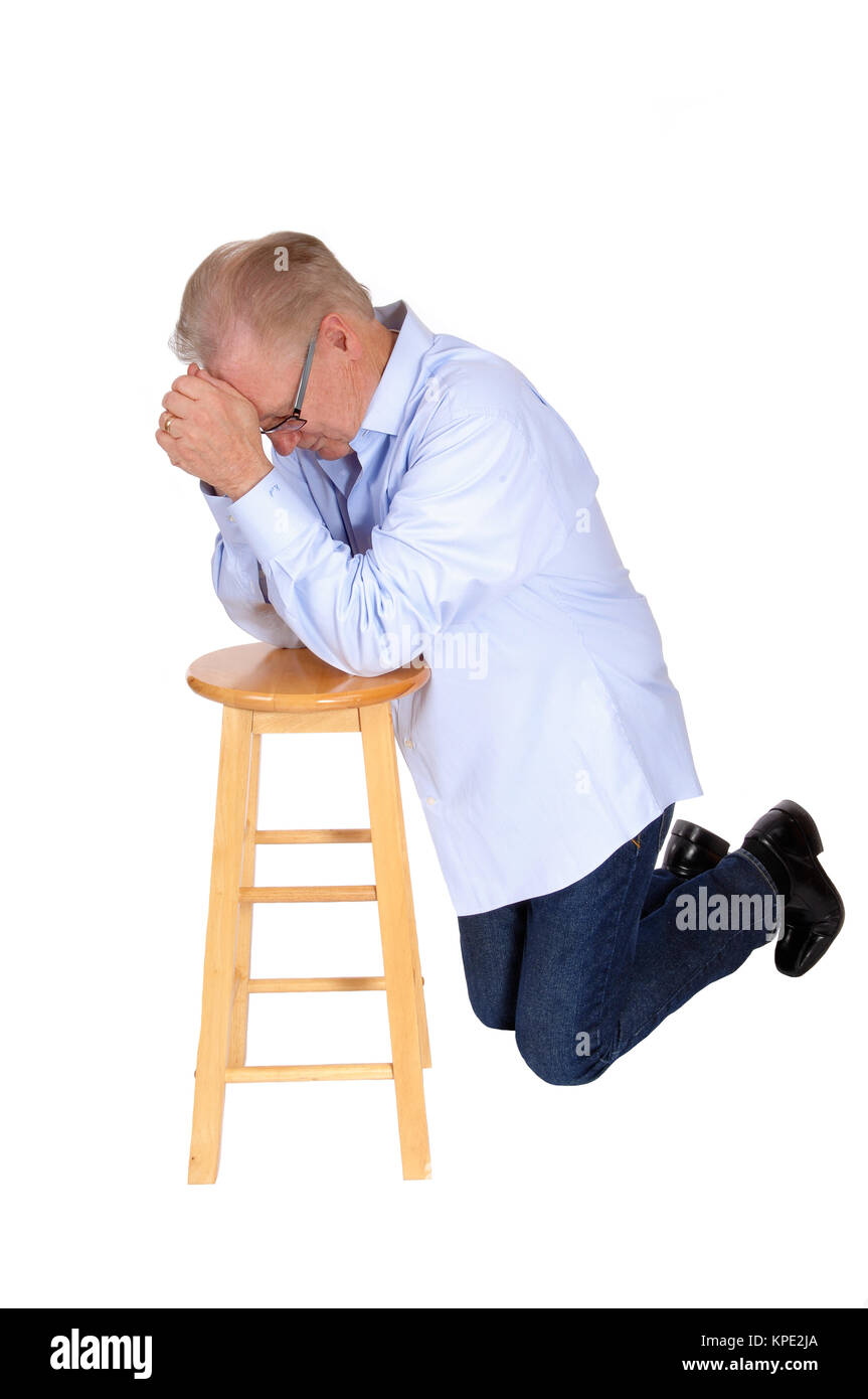 Elder kneeling hi-res stock photography and images - Alamy