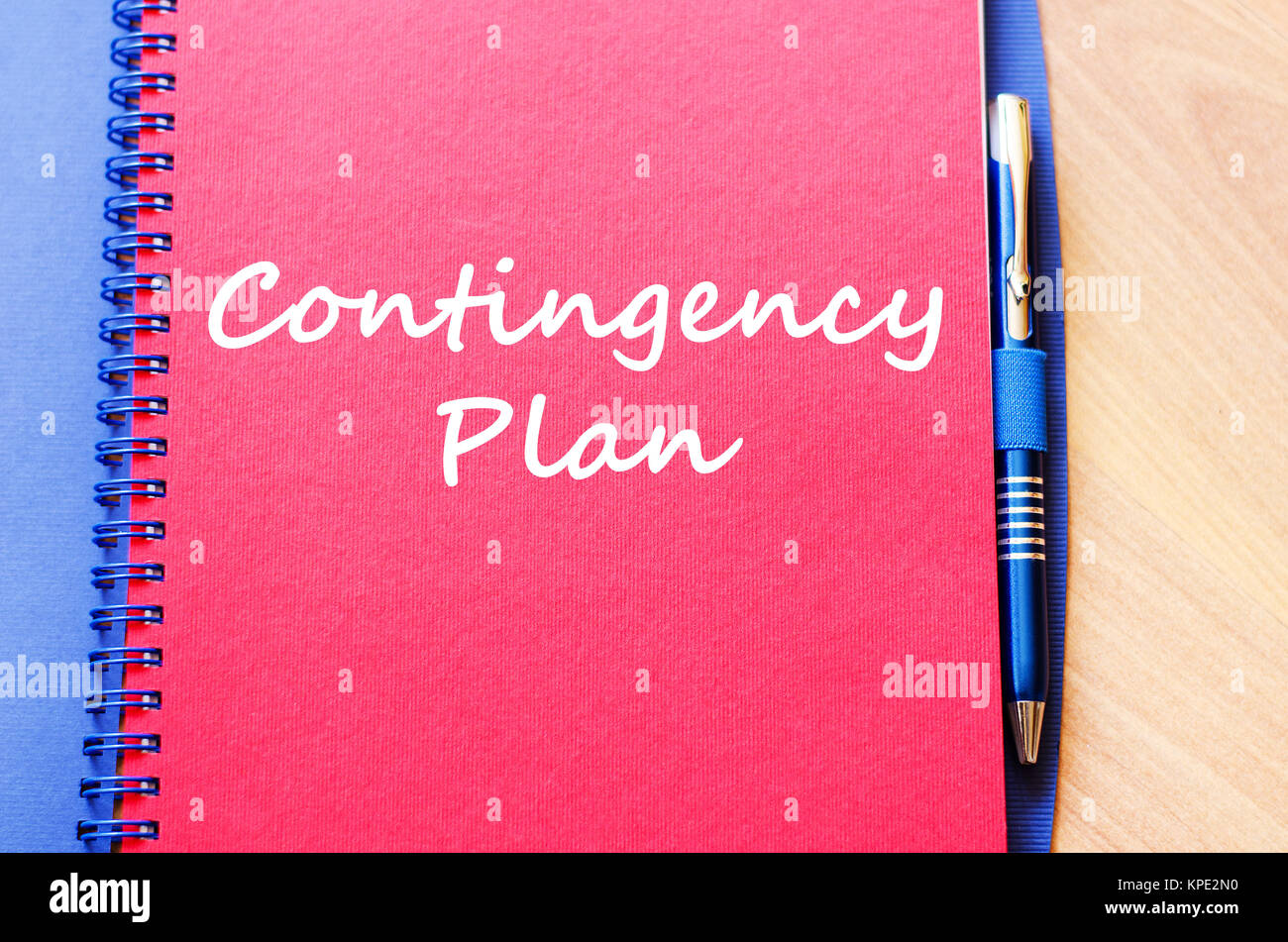 Contingency plan write on notebook Stock Photo - Alamy