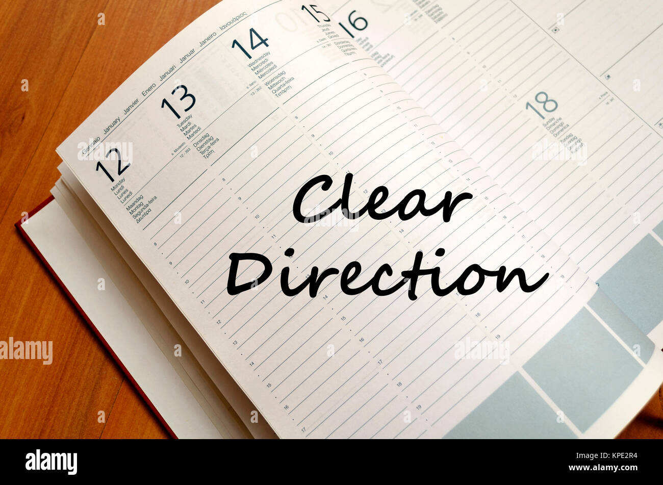 Clear direction write on notebook Stock Photo - Alamy