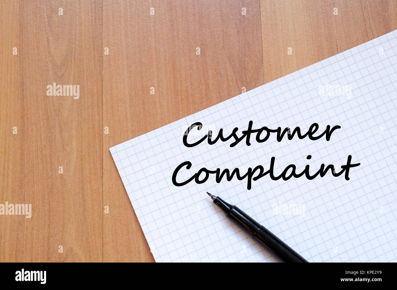 Customer complaint write on notebook Stock Photo - Alamy