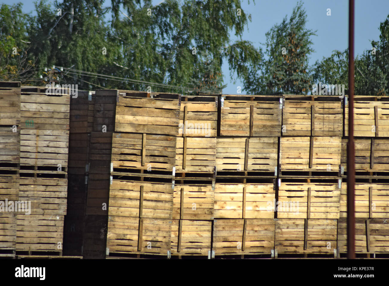 Wooden boxes stacked together Stock Photo - Alamy