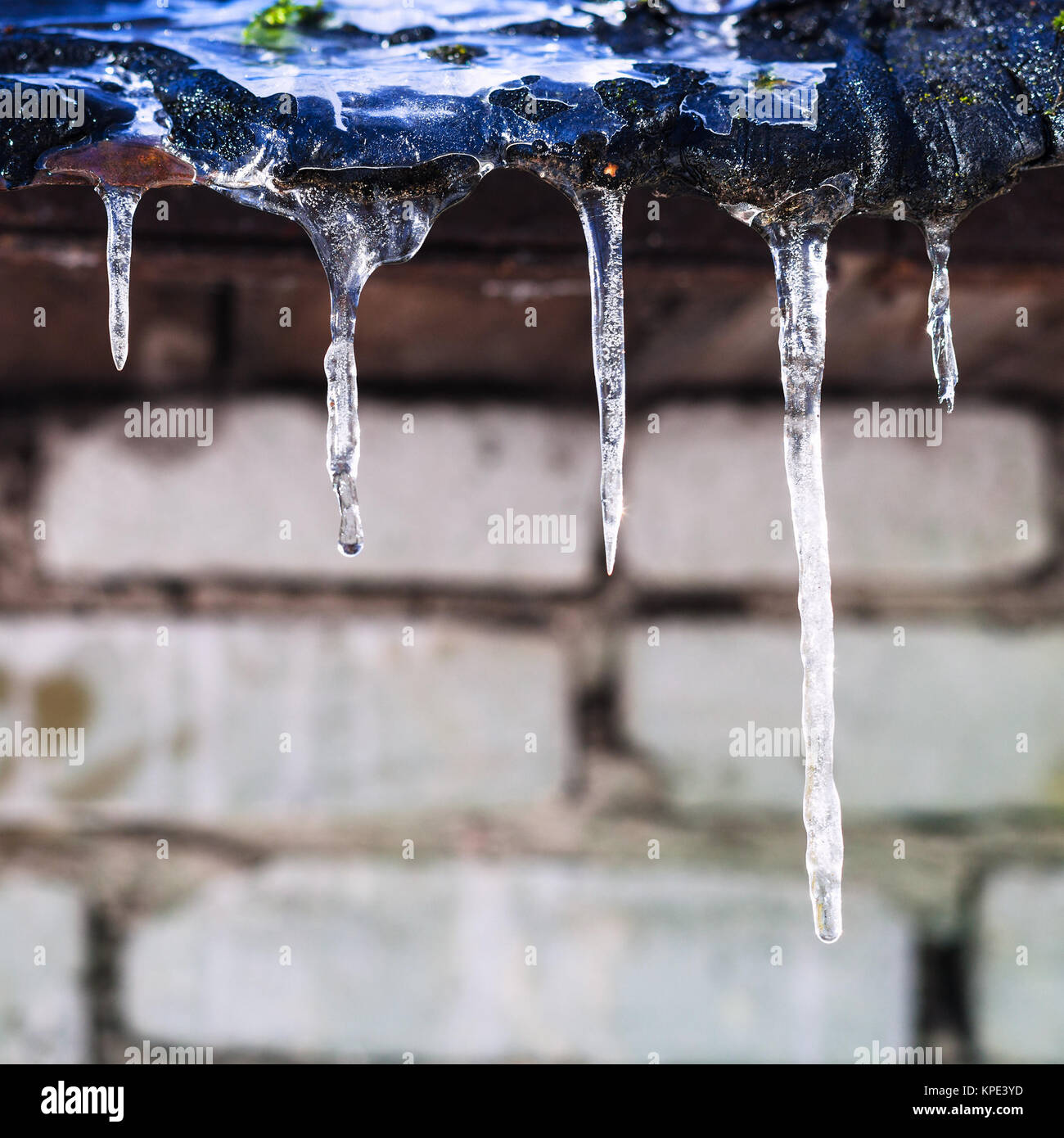 Icicles melt dripping on roof hi-res stock photography and images - Alamy