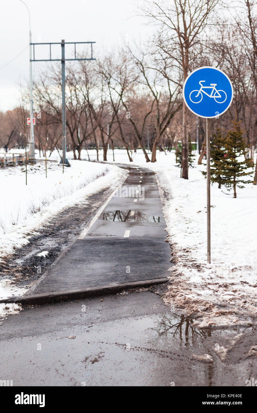 wet bicycle path in city in bad weather Stock Photo - Alamy