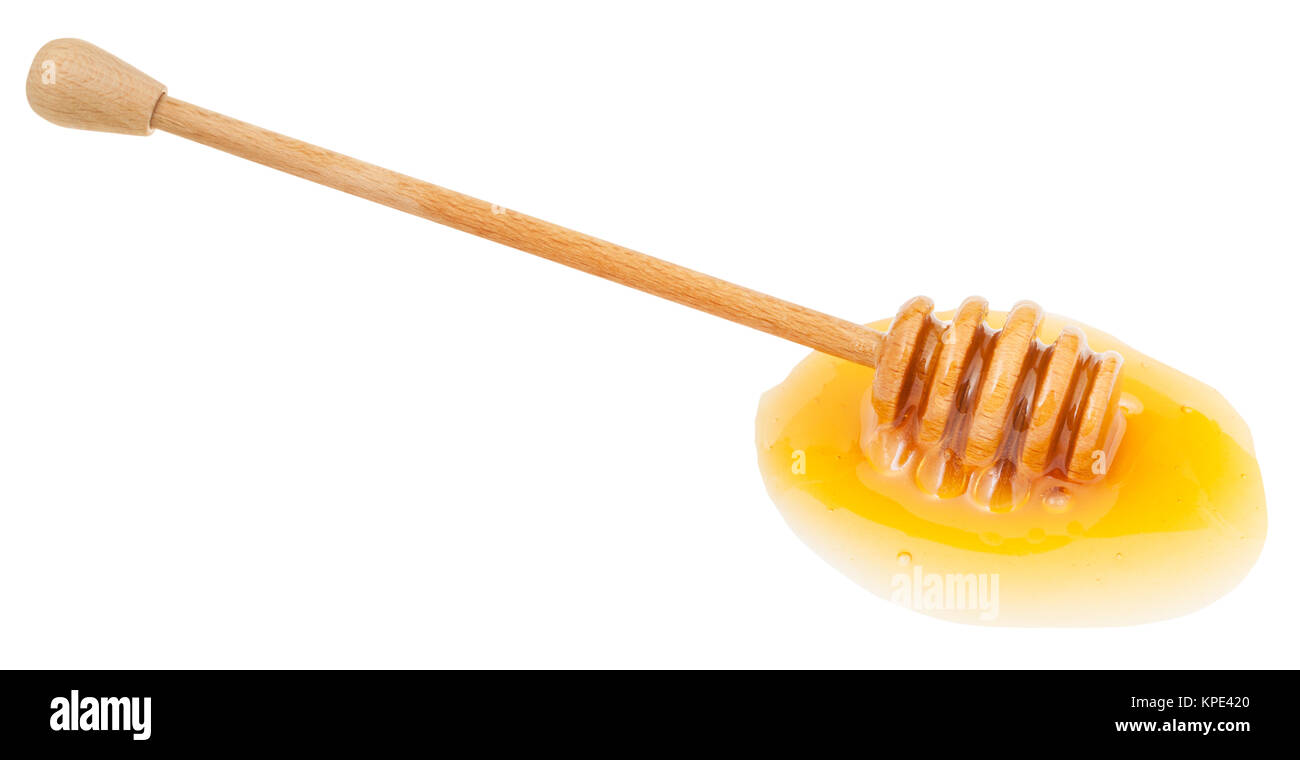 puddle of transparent honey and wooden stick Stock Photo - Alamy