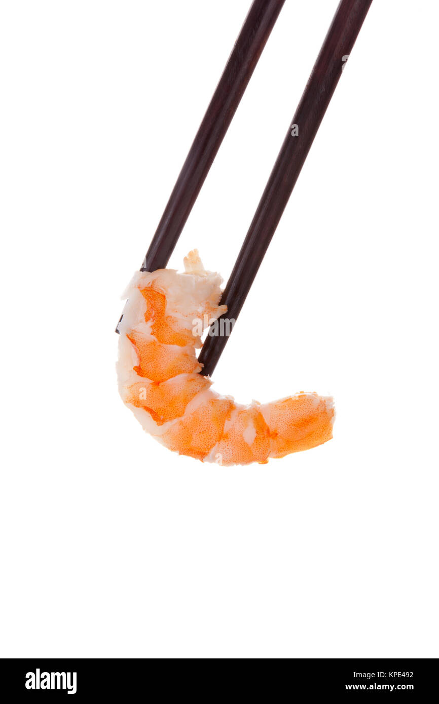 Shrimp in chopsticks isolated on white background. Culinary healthy ...