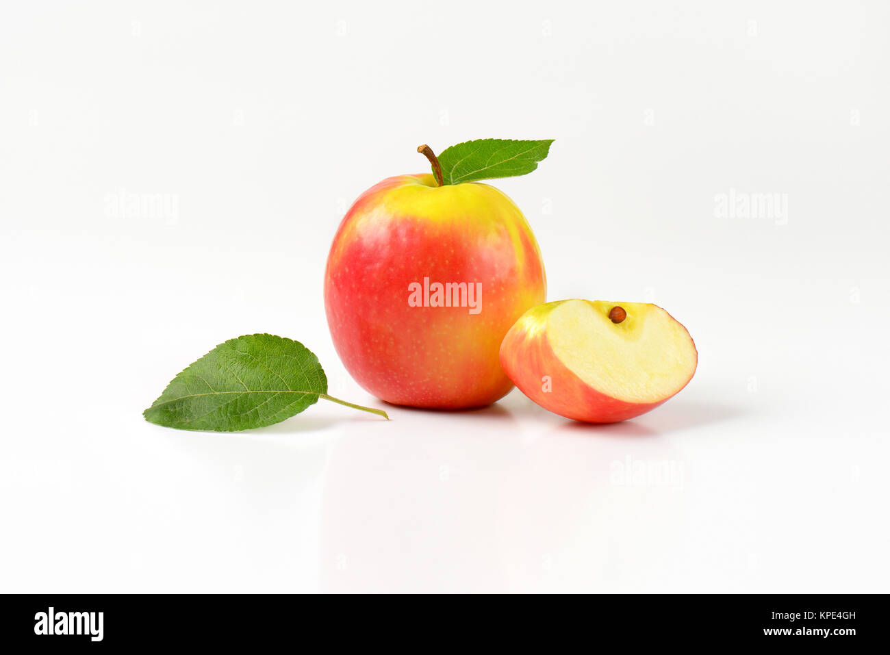 one whole apple and a quarter Stock Photo - Alamy