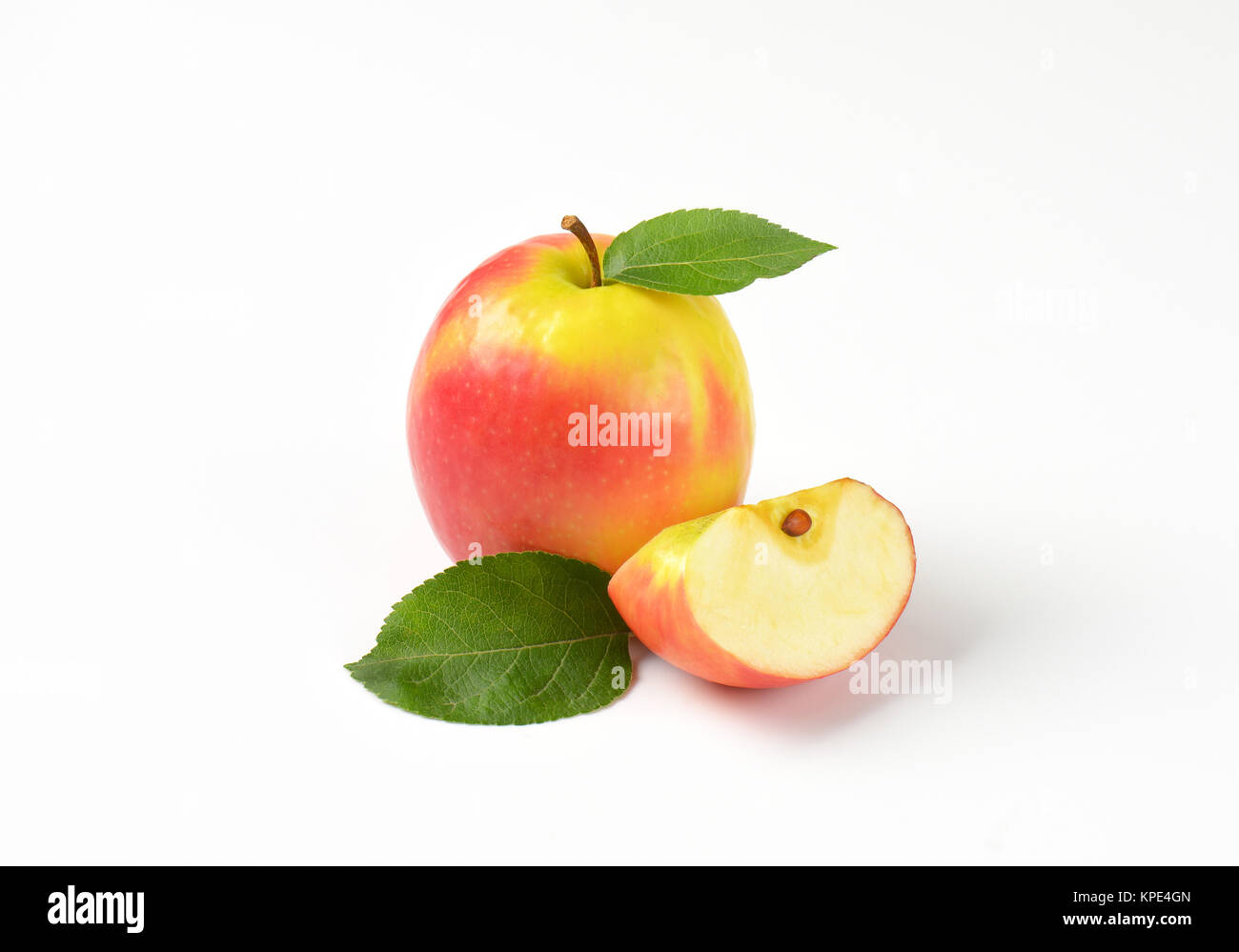 one whole apple and a quarter Stock Photo - Alamy