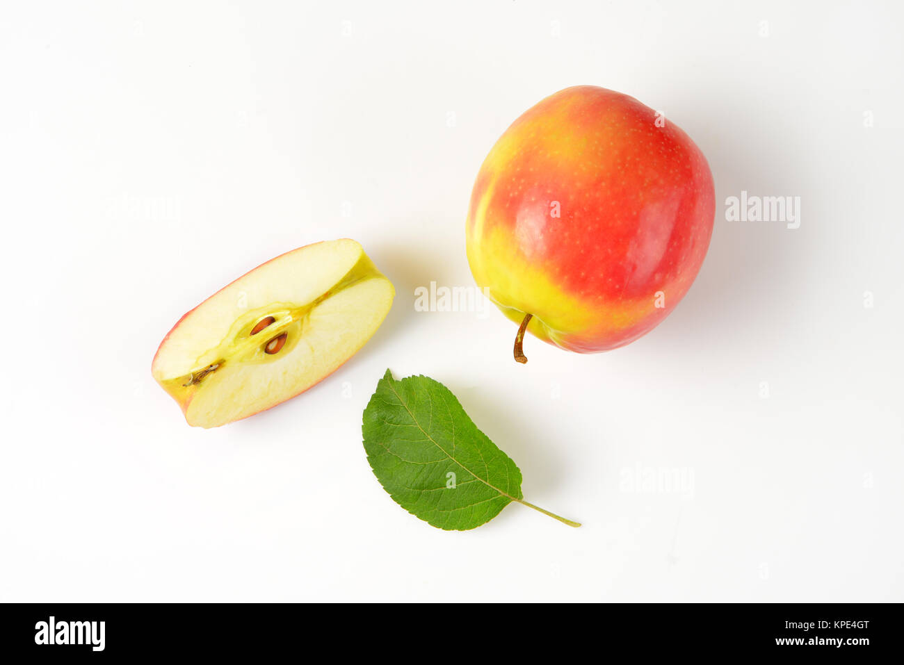 one whole apple and a quarter Stock Photo - Alamy