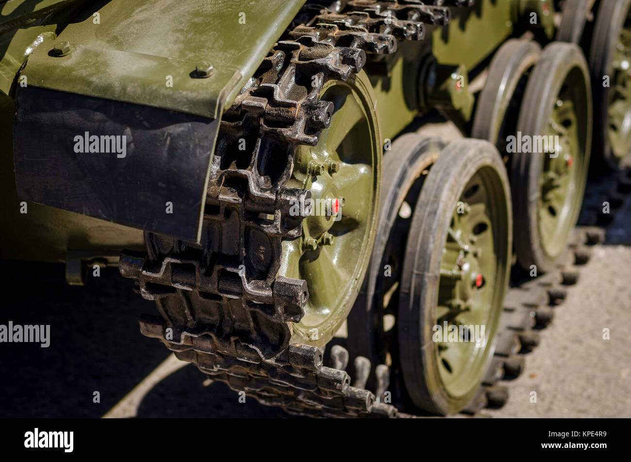 Caterpillars and tank wheels Stock Photo - Alamy
