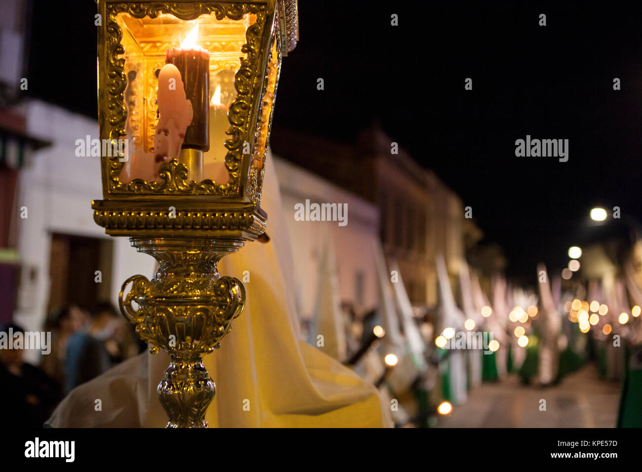 Bearer or nazareno holding a cross at Holy Week Procession, Spain Stock ...