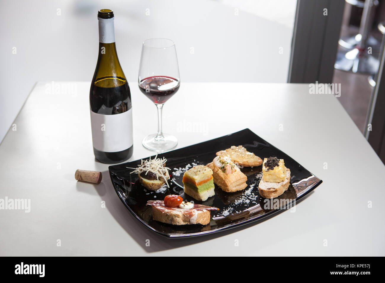 Spanish tapas and red wine Stock Photo - Alamy