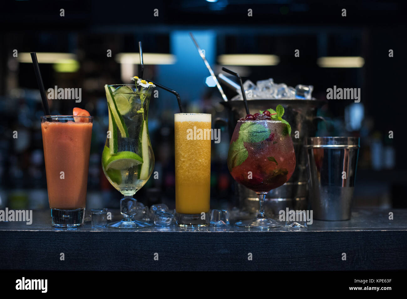 cocktails on bar background Stock Photo - Alamy