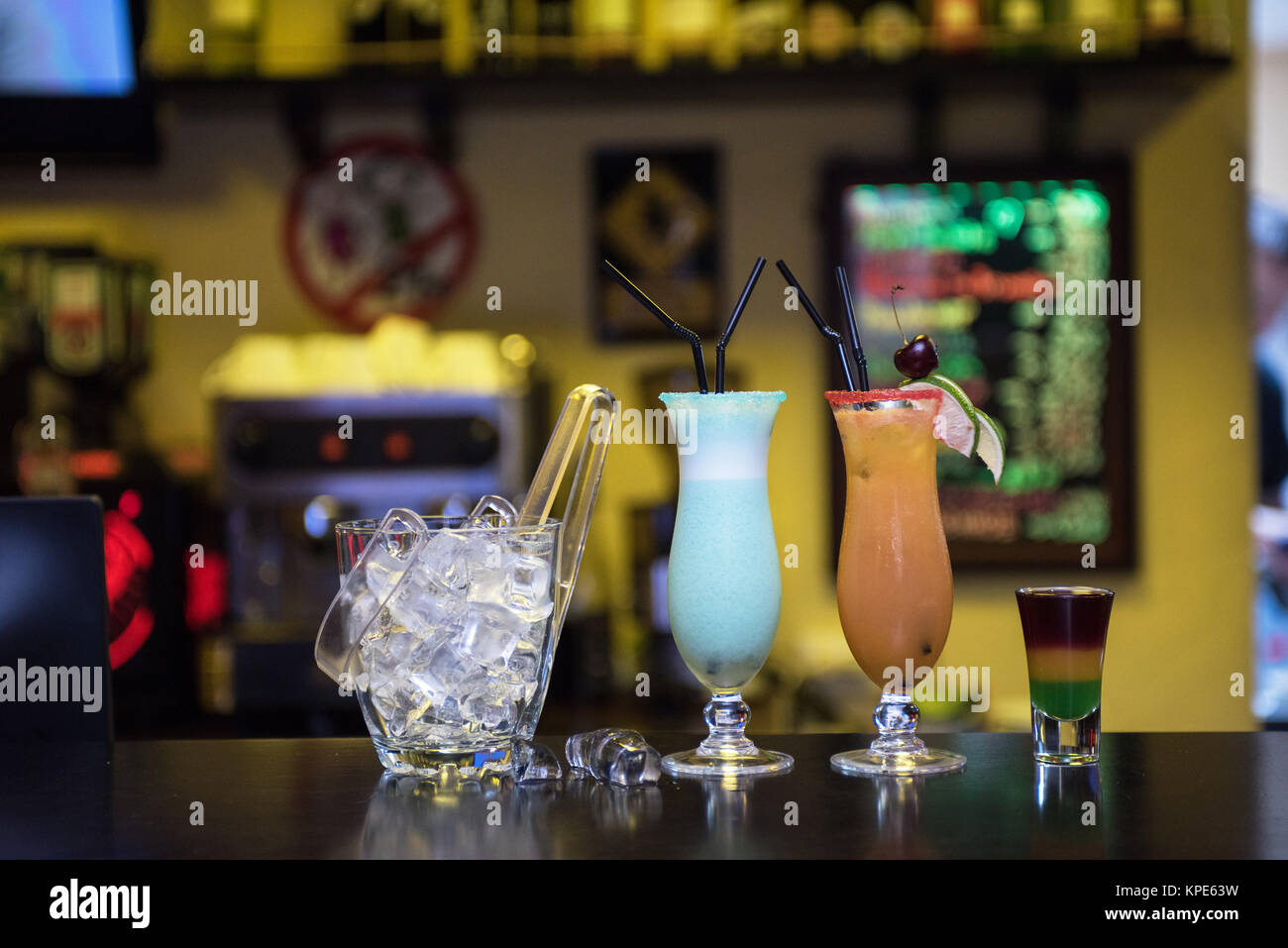 cocktails on bar background Stock Photo - Alamy