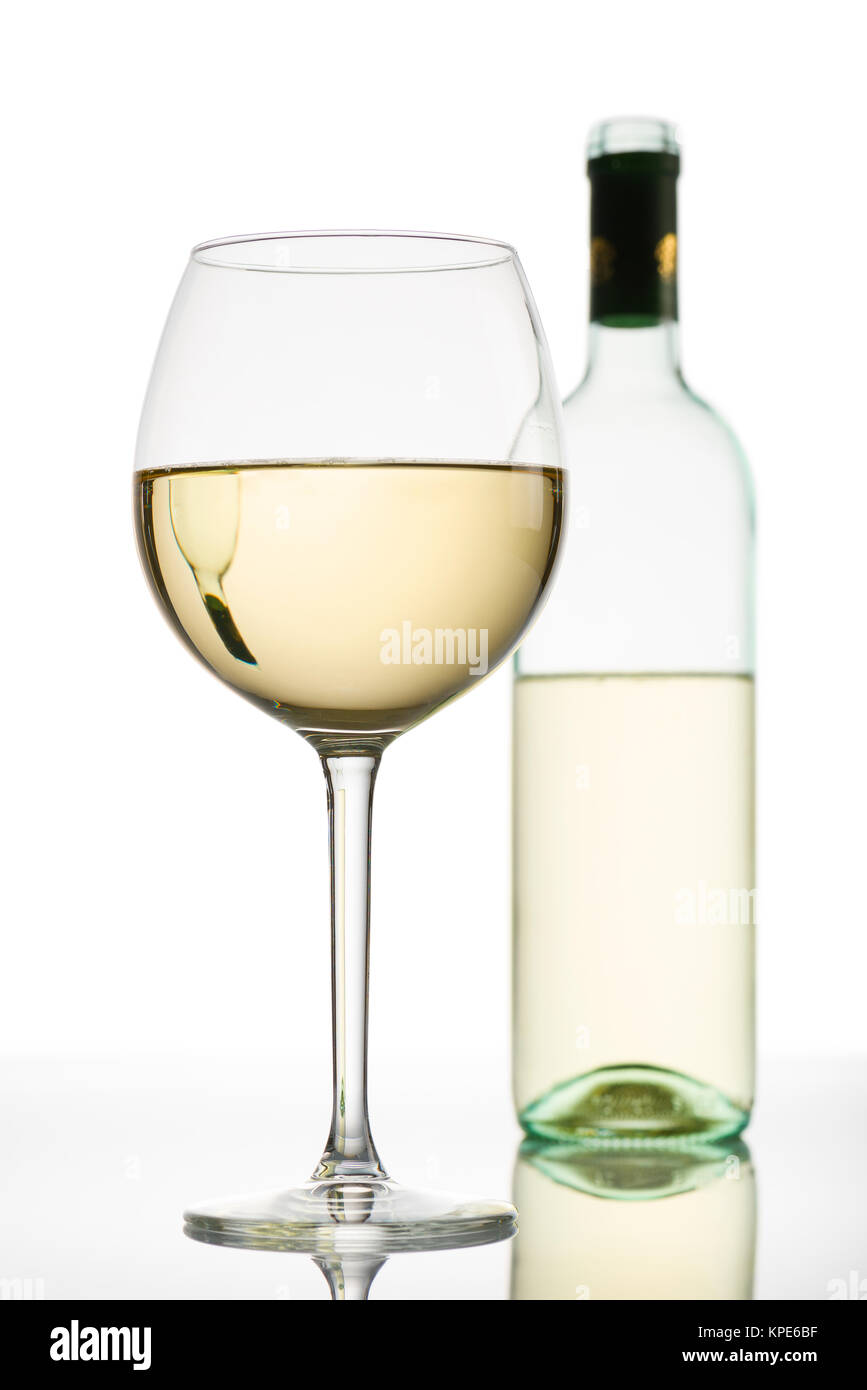 goblet with white wine and bottle on background Stock Photo - Alamy