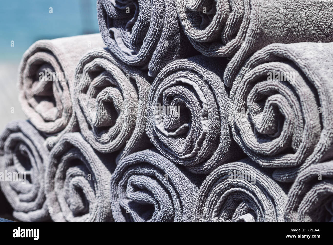 Stack of rolled towels in hotel near beach Stock Photo - Alamy