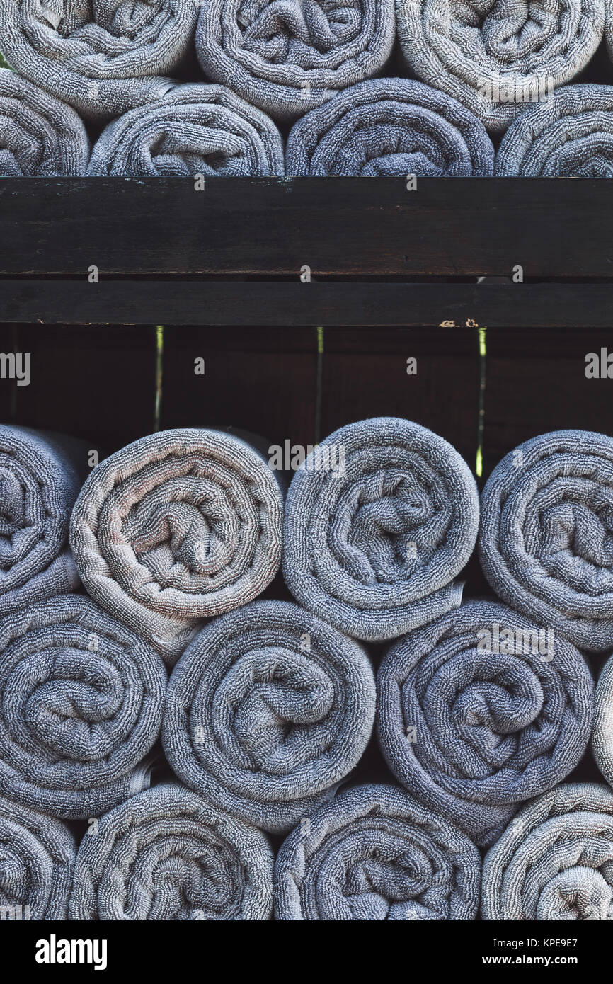 Stack of rolled towels in hotel near beach Stock Photo - Alamy