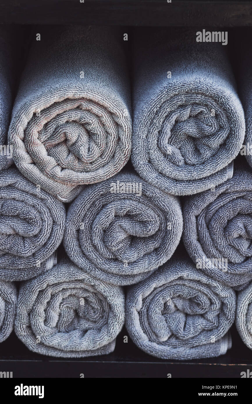 Stack of rolled towels in hotel near beach Stock Photo - Alamy