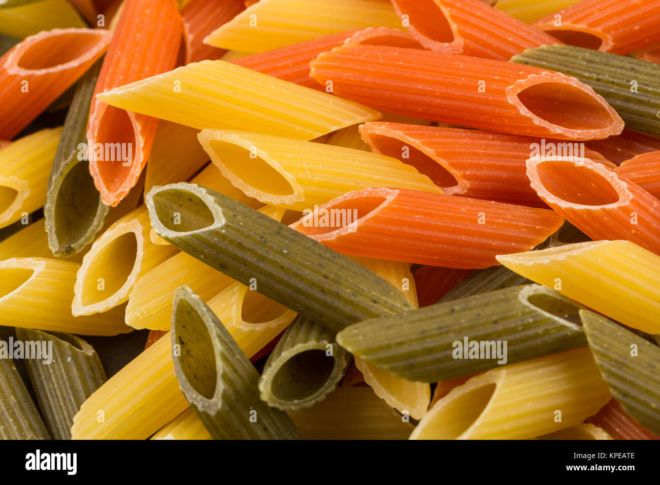 Three color penne pasta Stock Photo - Alamy