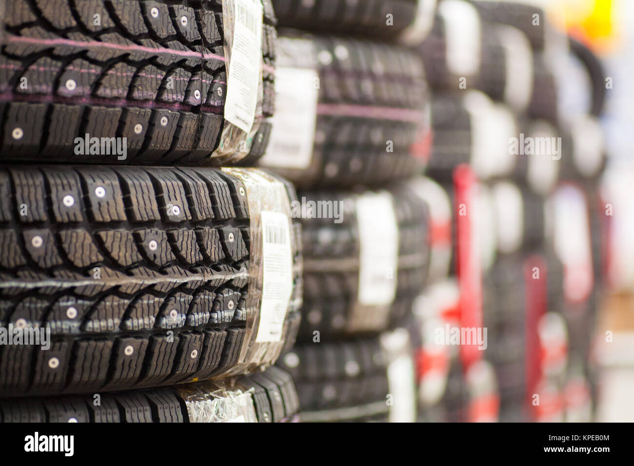 Studded tire on a background winter studded tires for a car new close ...