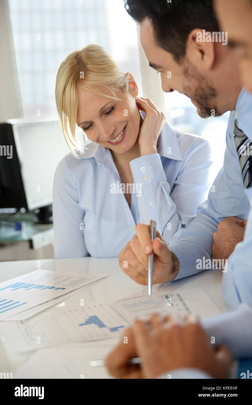 Business people working on financial project Stock Photo - Alamy