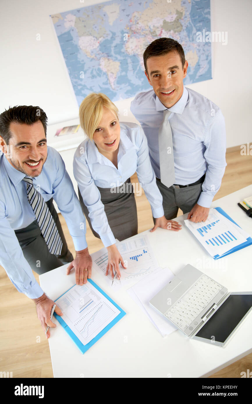 Upper view of business people working in office Stock Photo - Alamy
