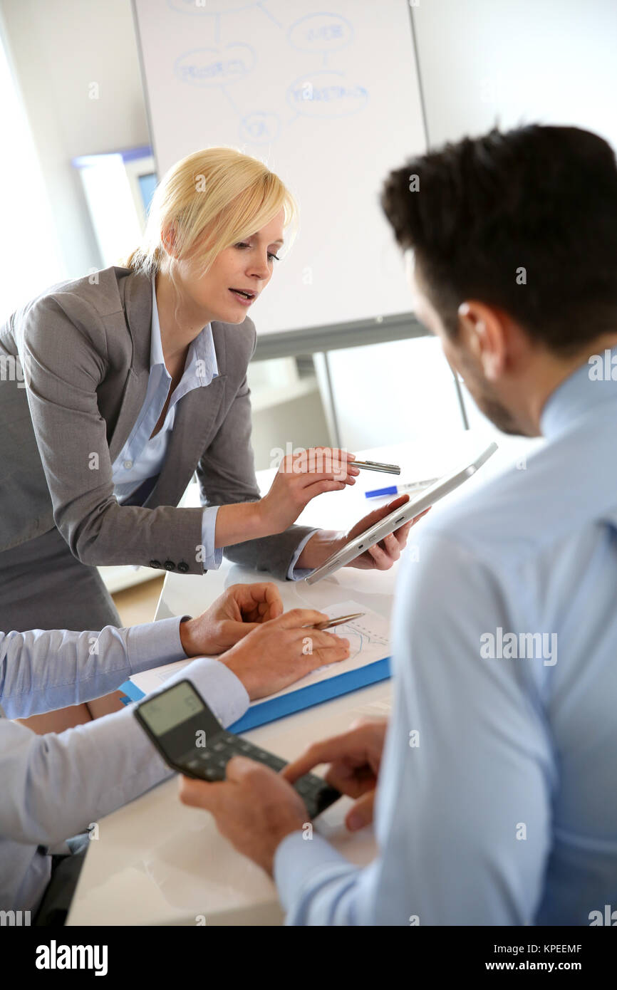 Executive woman making business presentation Stock Photo - Alamy